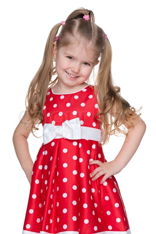 Adorable kleines Mädchen in einem roten ... | Stock Bild | Colourbox