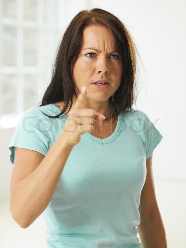 An angry caucasian woman in t-shirt | Stock image | Colourbox