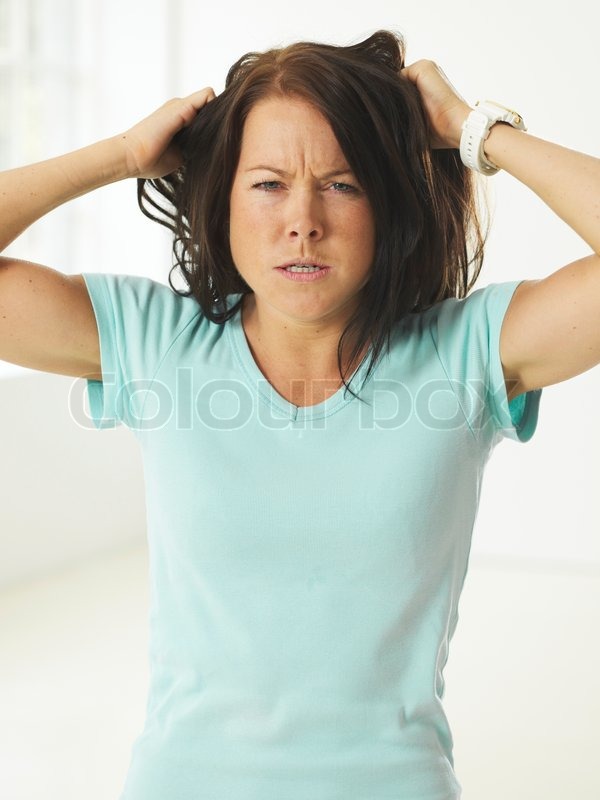 Portrait of a very frustrated woman | Stock image | Colourbox