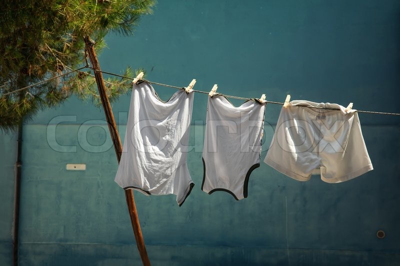 Laundry hanging out to dry outdoors in ... | Stock image | Colourbox