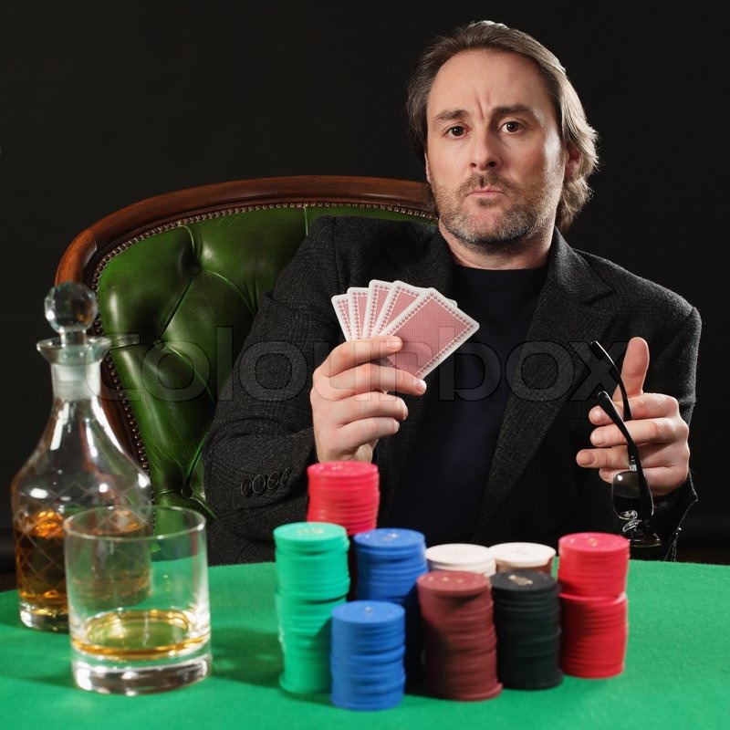Photo of a professional poker player ... | Stock image | Colourbox