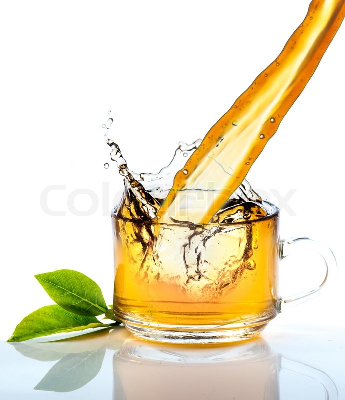 Tea flowing in cup | Stock image | Colourbox