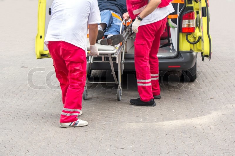 Paramedics rushing patient into an ... | Stock image | Colourbox
