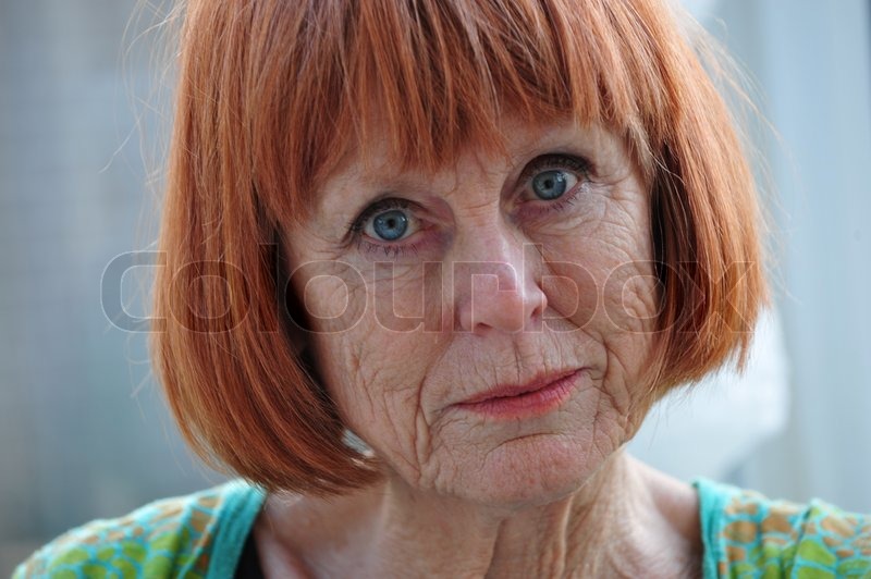 Redhead, woman, 60 | Stock Photo | Colourbox