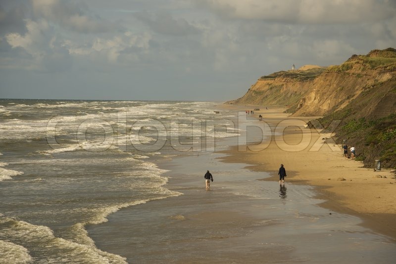 People walking on a danish beach at Nr. ... | Stock image | Colourbox