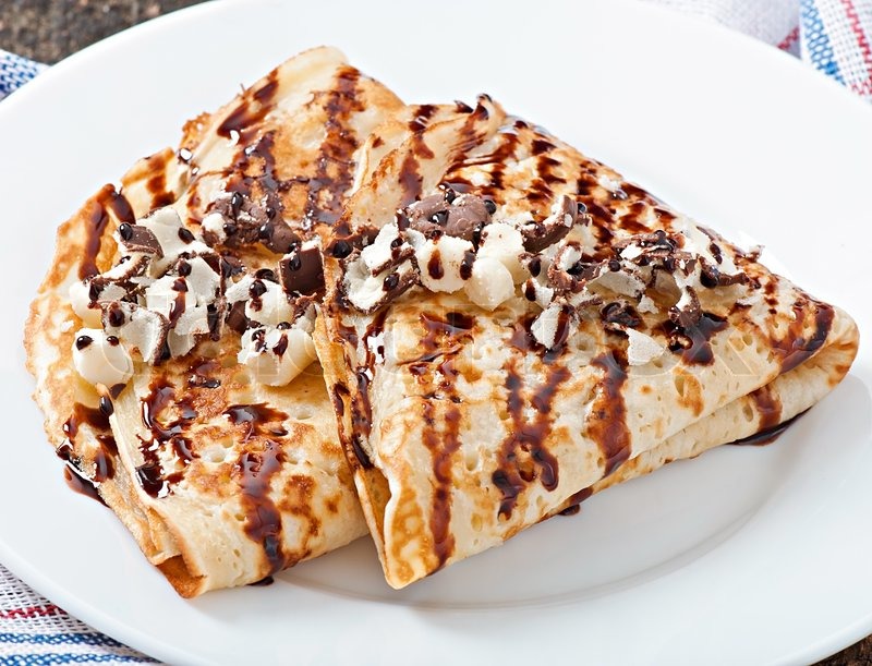 Pancakes with chocolate syrup | Stock image | Colourbox