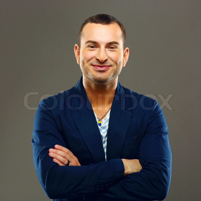 Portrait of a smiling man in casual ... | Stock image | Colourbox