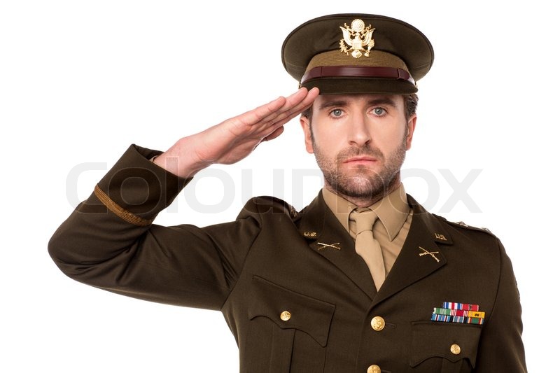 Young army officer saluting isolated on ... | Stock image | Colourbox