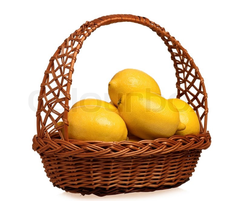 Fresh ripe lemons in wicker basket ... | Stock image | Colourbox