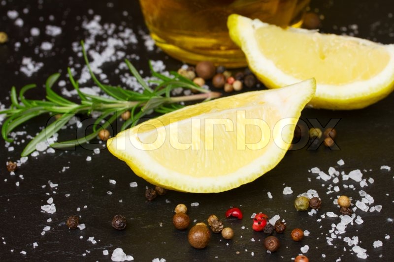 Sliced fresh lemon with mix of spices ... | Stock image | Colourbox