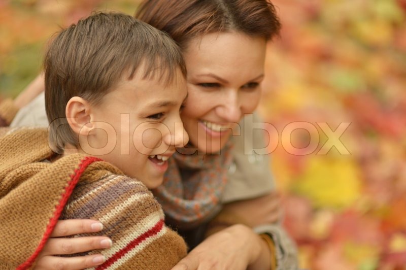 Beautiful Mother With Son In Autumn Stock Image Colourbox