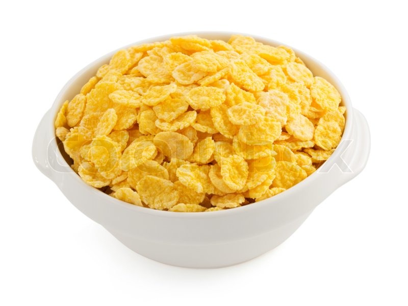 Corn flakes in bowl isolated on white ... | Stock image | Colourbox