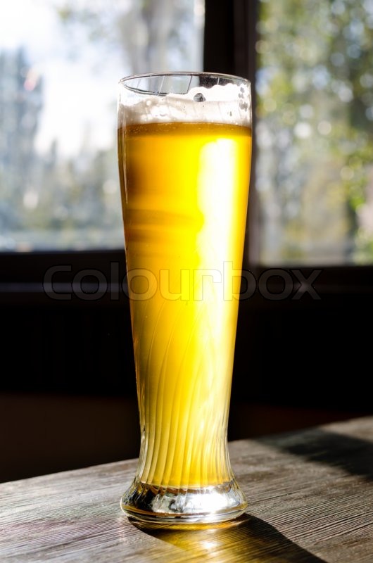 Ice Cold Beer on Classic Tall Glass ... | Stock image | Colourbox