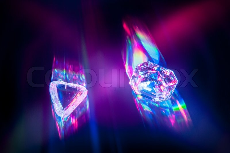 Beautiful glowing gems on a dark ... | Stock image | Colourbox