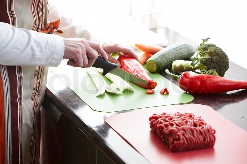 Hygienic way of cooking in the kitchen | Stock image | Colourbox