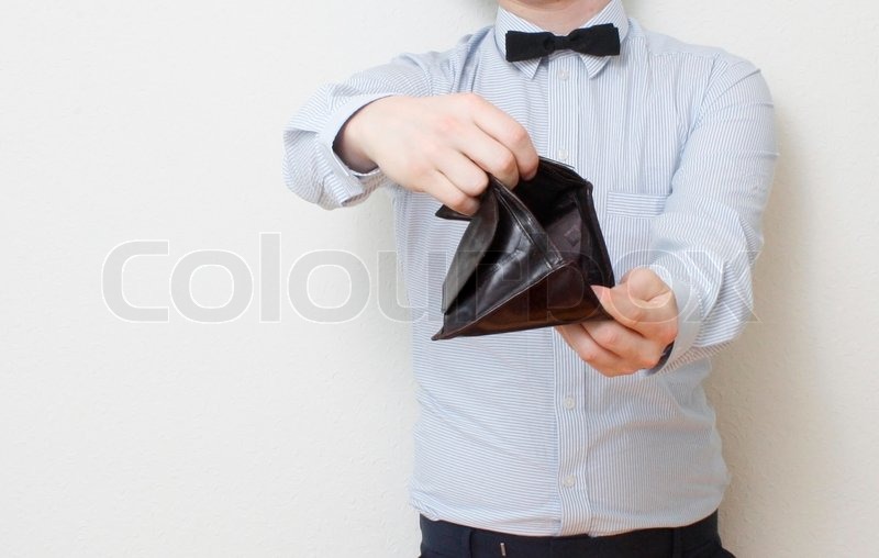 A teenage boy with an empty wallet | Stock image | Colourbox