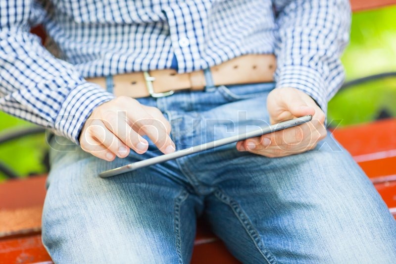 Man hand touching screen on modern ... | Stock image | Colourbox