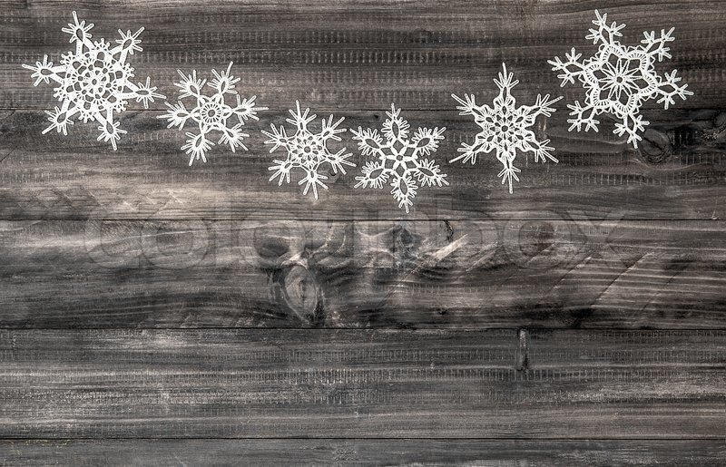White snowflakes on rustic wooden ... | Stock image | Colourbox