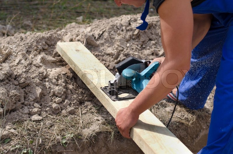 Carpenter or joiner working on a ... | Stock image | Colourbox