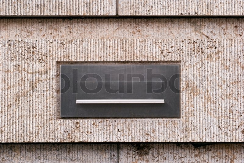Blank letter box in a wall | Stock image | Colourbox