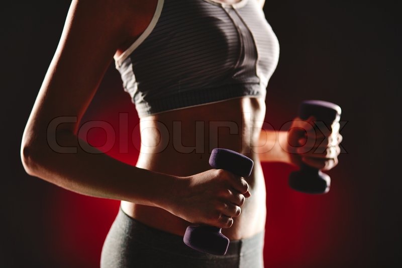 Female torso in activewear during ... | Stock image | Colourbox