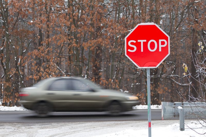 Stop road sign on a highway with ... | Stock image | Colourbox