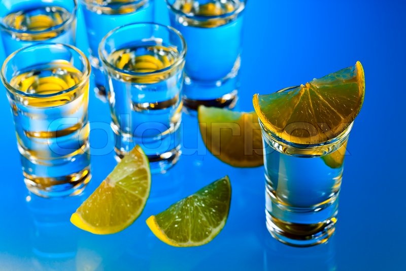 alcoholic drink with lime on a glass ... | Stock image | Colourbox
