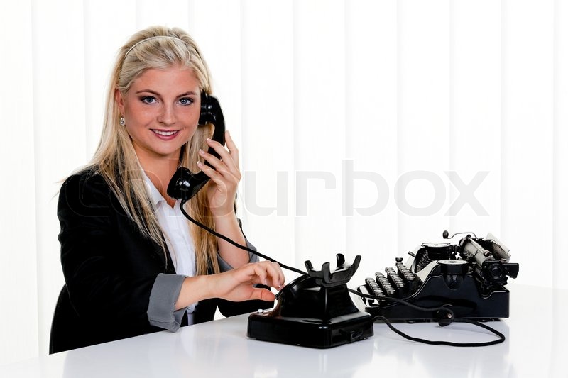 Young woman in a telephone call in the ... | Stock image | Colourbox