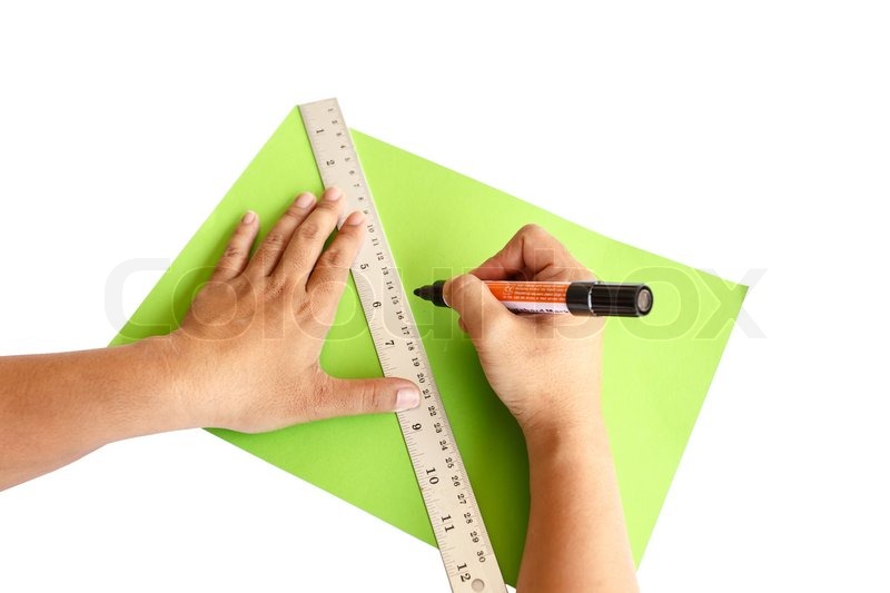 Hand using ruler and marker to make the ... | Stock image | Colourbox