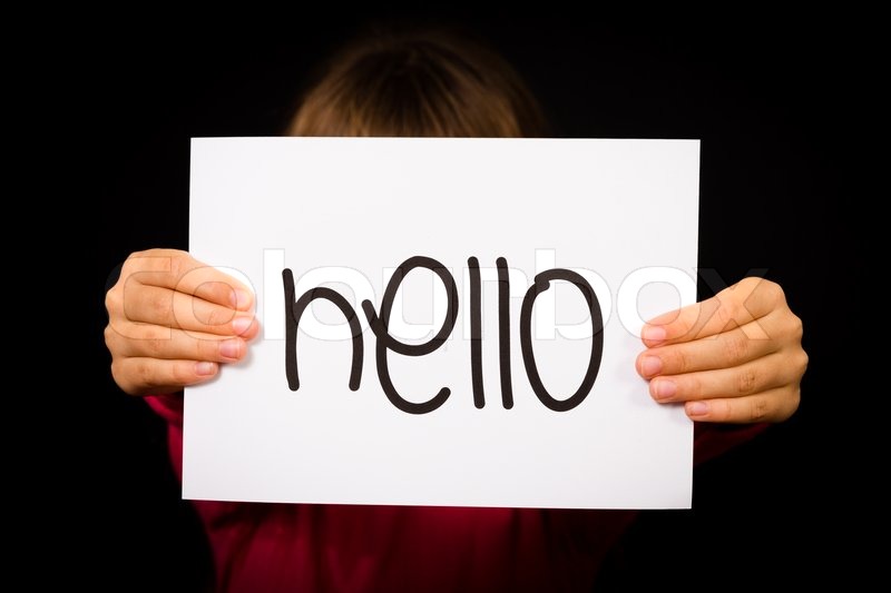 Studio shot of child holding a Hello ... | Stock image | Colourbox