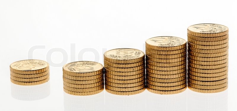 Einige Berge von Münzen auf weißem ... | Stock Bild | Colourbox