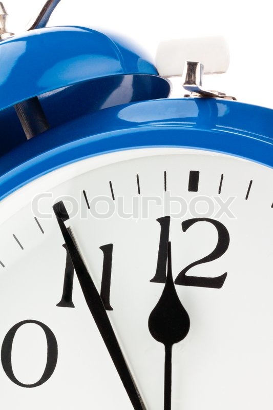 11:55 on a clock. Time for decisions | Stock image | Colourbox