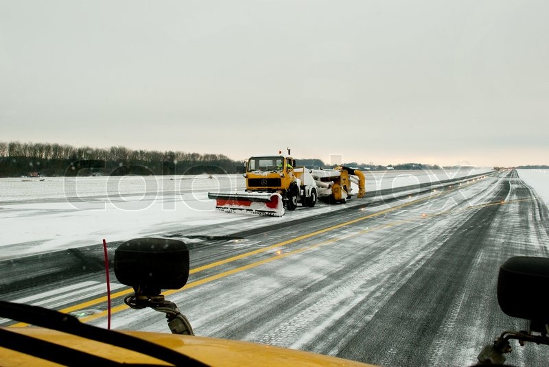 Clearing snow on runway | Stock image | Colourbox