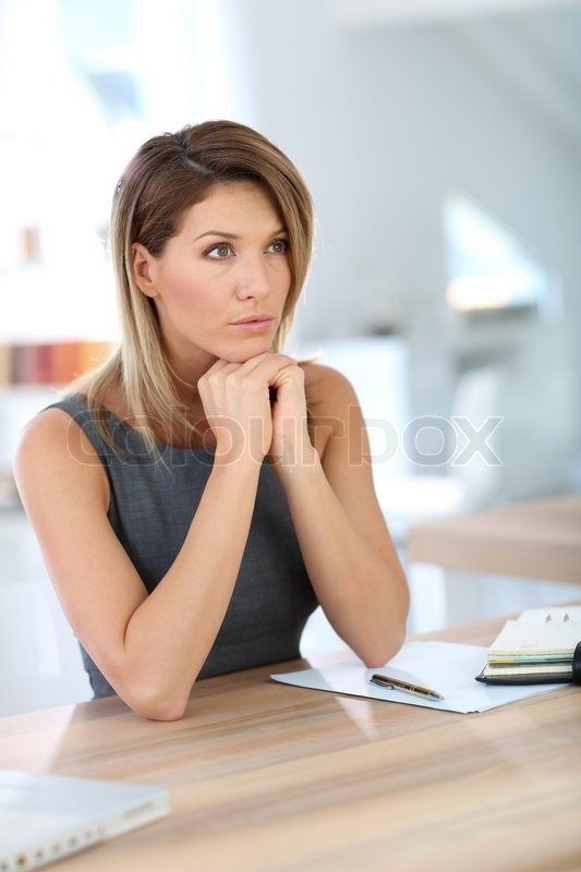 Portrait of businesswoman with serious ... | Stock image | Colourbox