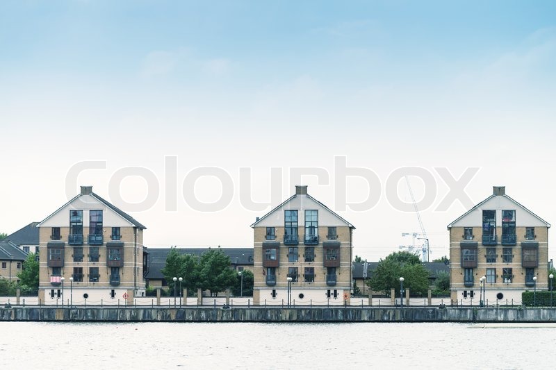 Old buildings along the river. | Stock image | Colourbox