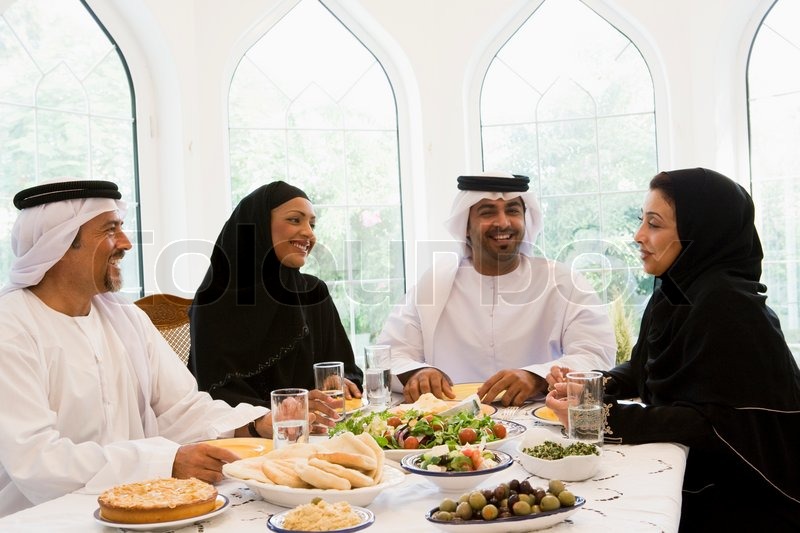 Arabic, eating, four people | Stock Photo | Colourbox