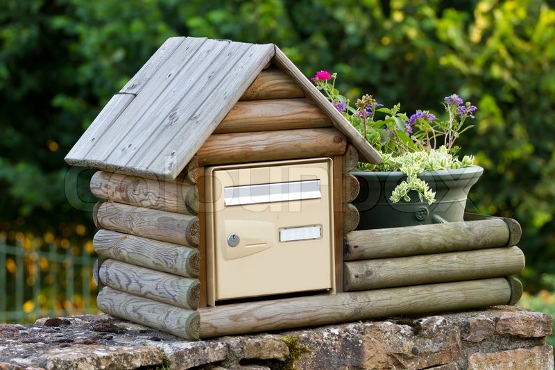 Decorative wooden post box in France | Stock image | Colourbox