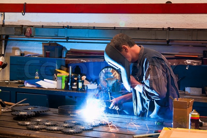 Welder in the workshop in the metal ... | Stock image | Colourbox