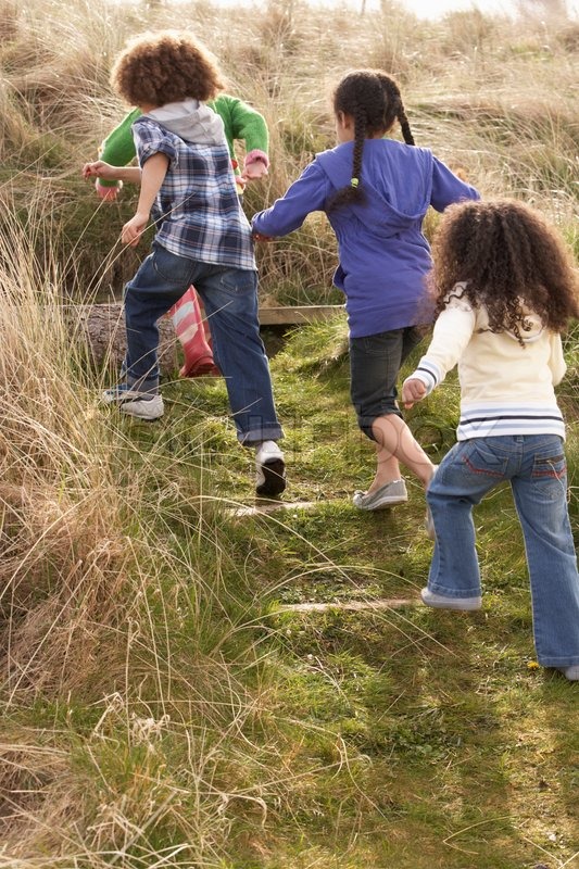 Group Of Children Playing In Field ... | Stock image | Colourbox