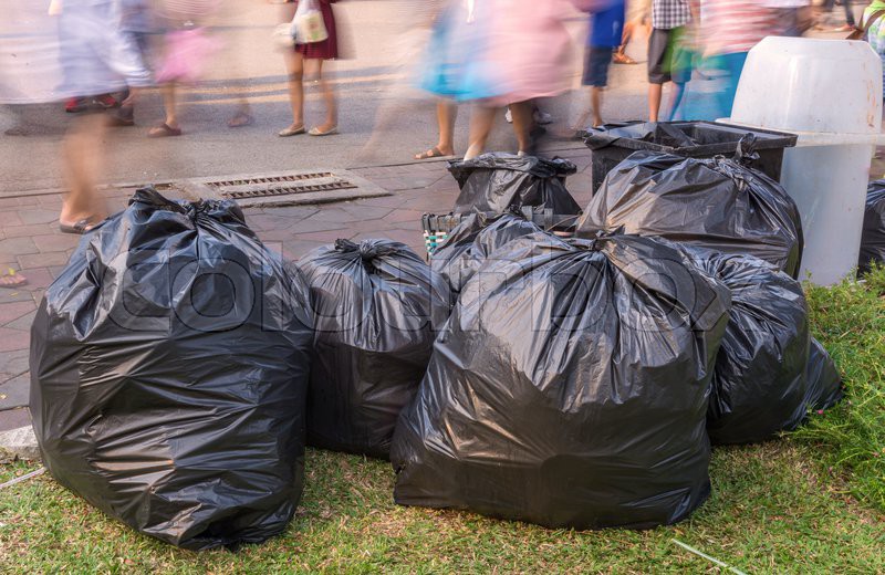 Garbage Bags on the sidewalk. | Stock image | Colourbox