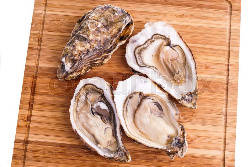 Gourmet fresh french oysters on a ... | Stock image | Colourbox