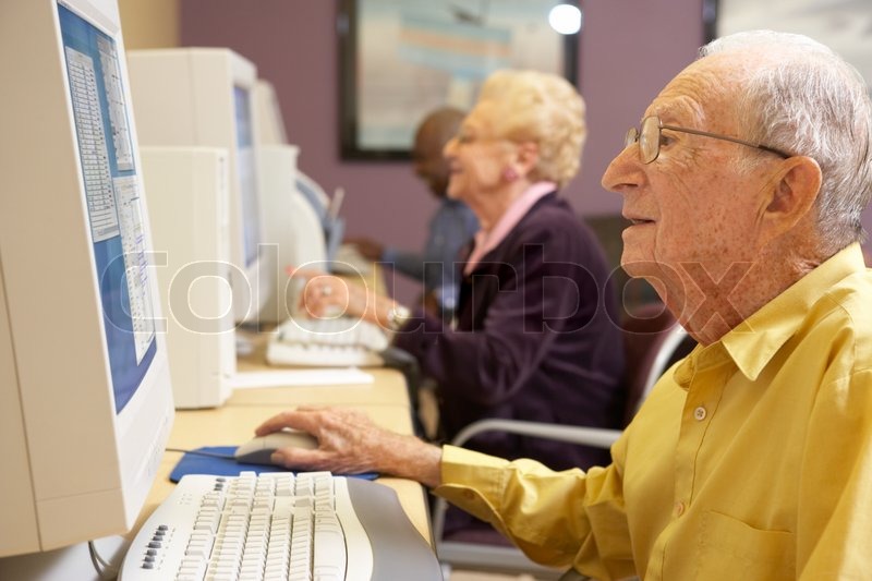 Senior man using computer | Stock image | Colourbox