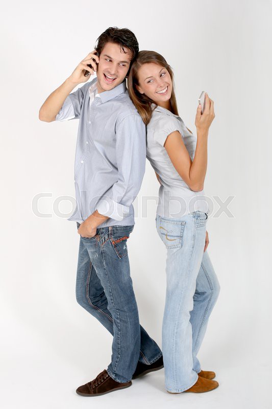 Cheerful couple using smartphone | Stock image | Colourbox