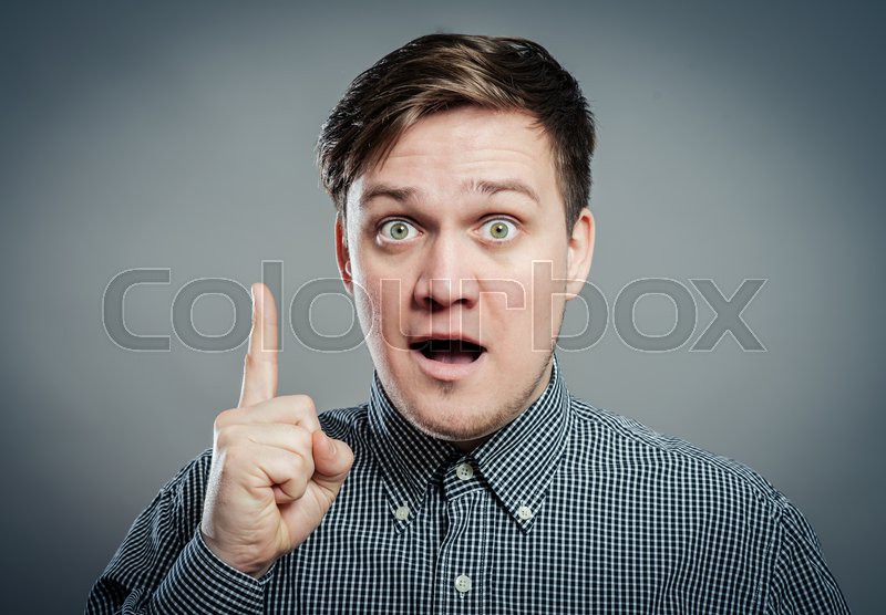 Portrait of surprise smiling young man ... | Stock image | Colourbox