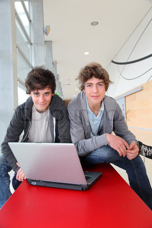 Group of teenage boys at school with ... | Stock image | Colourbox