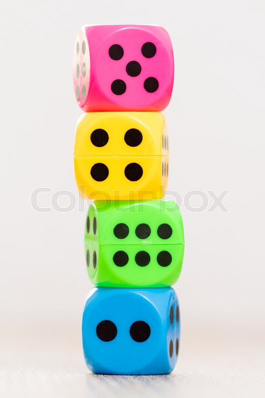 Stack of colorful dice, isolated on ... | Stock image | Colourbox
