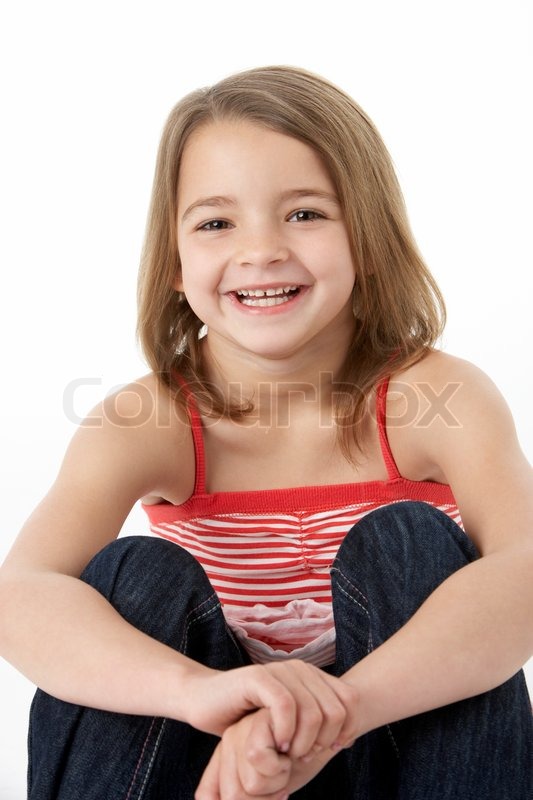 Junge Mädchen sitzen in Studio | Stock Bild | Colourbox