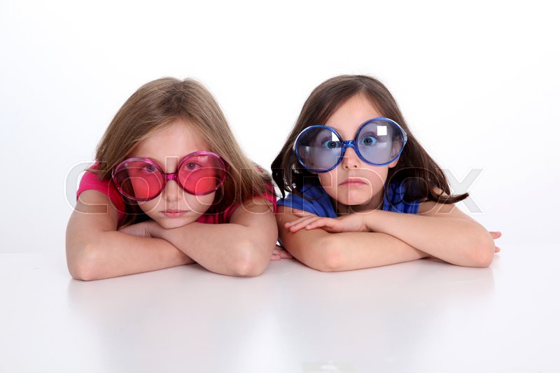 Portrait of girls doing funny faces | Stock image | Colourbox