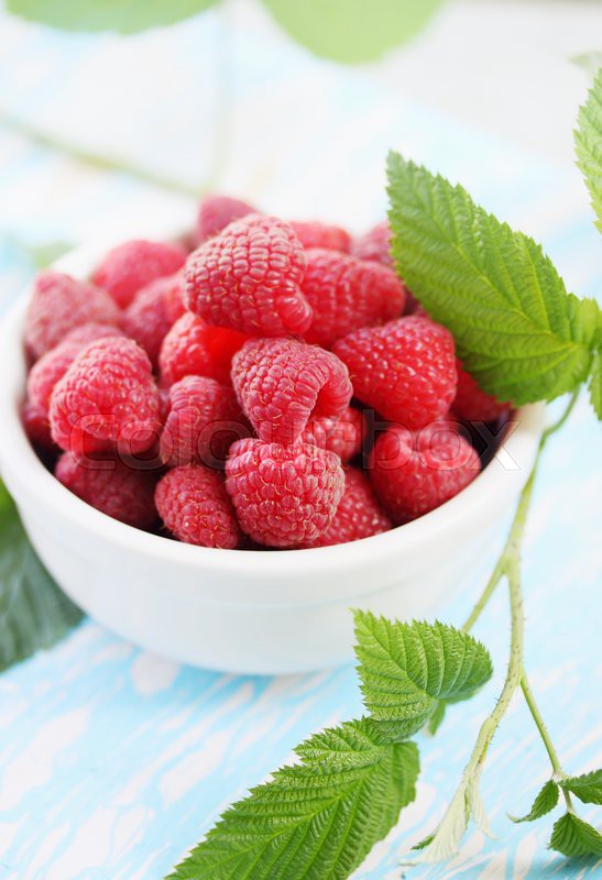 Fresh big juicy raspberry in a bowl | Stock image | Colourbox