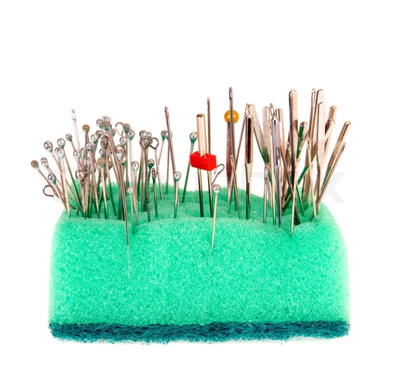 Needles in sponge isolated on white ... | Stock image | Colourbox